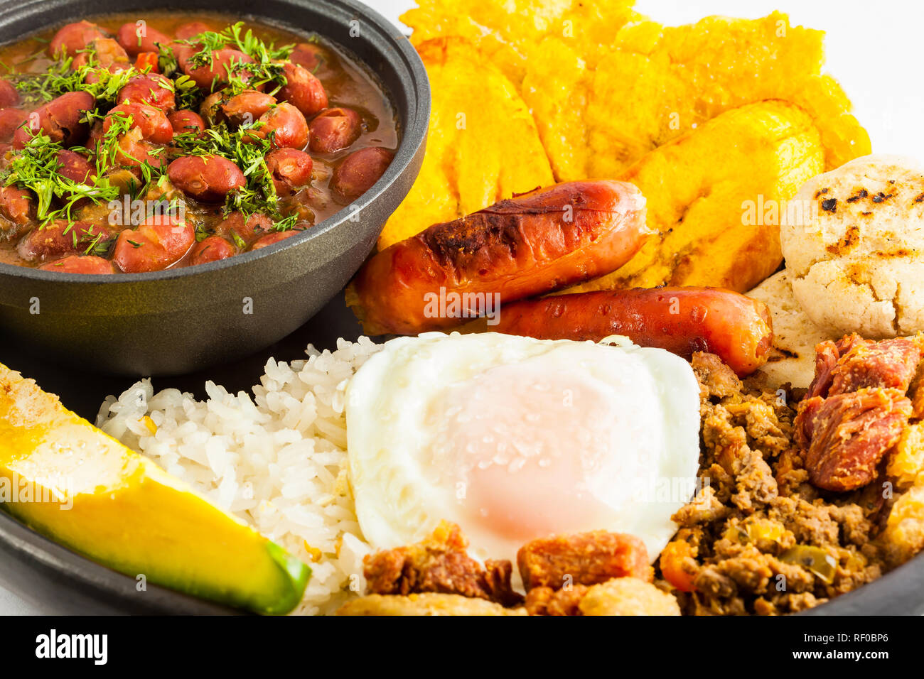 Traditional Colombian dish called Bandeja Paisa: a plate typical of ...