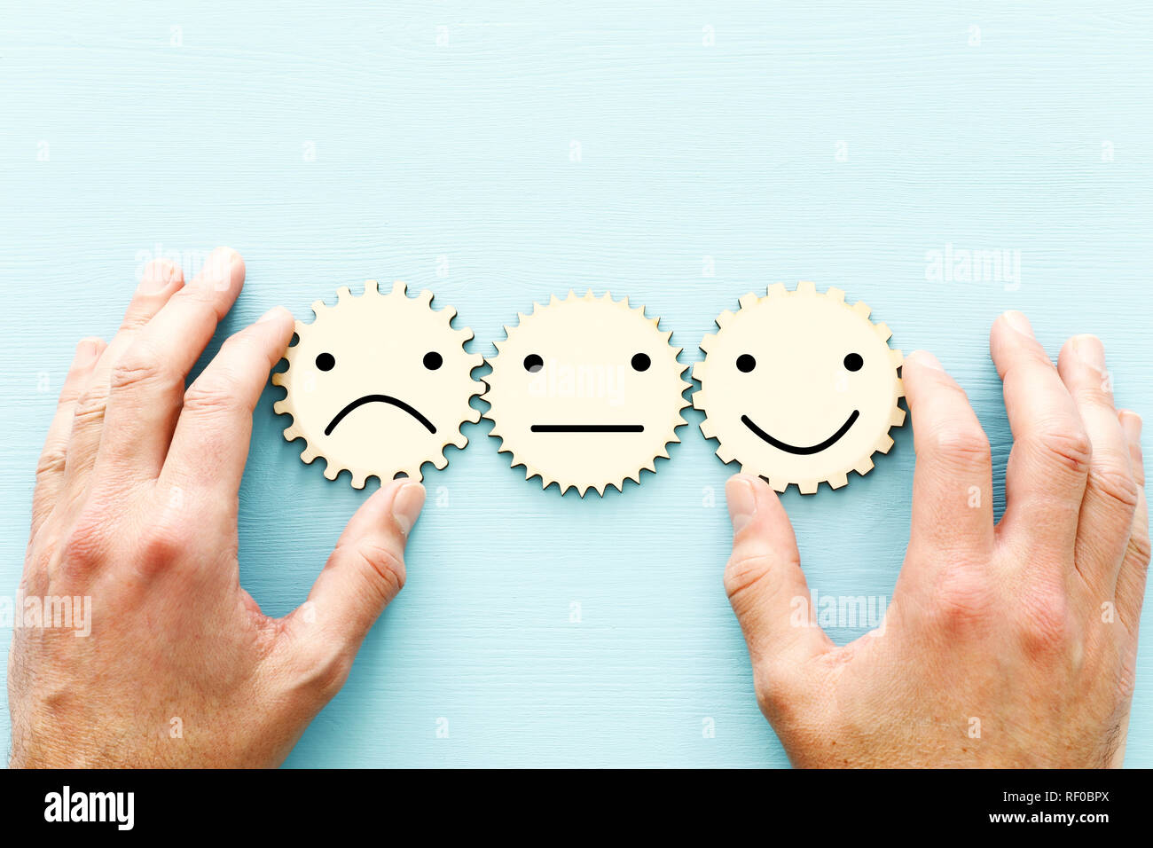 concept photo of chosen person among others. a smiling face stands out ...