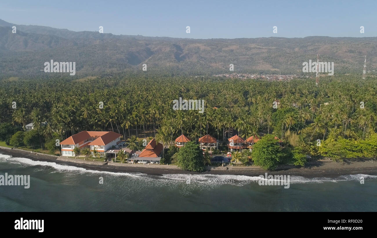 aerial seascape luxury hotel on beach background mountainss in tropical ...