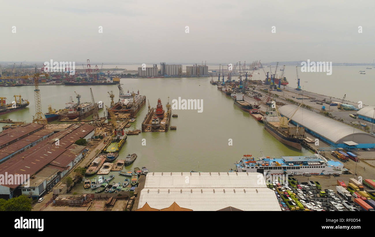 aerial view cargo and passenger seaport with ships and crane Tanjung ...