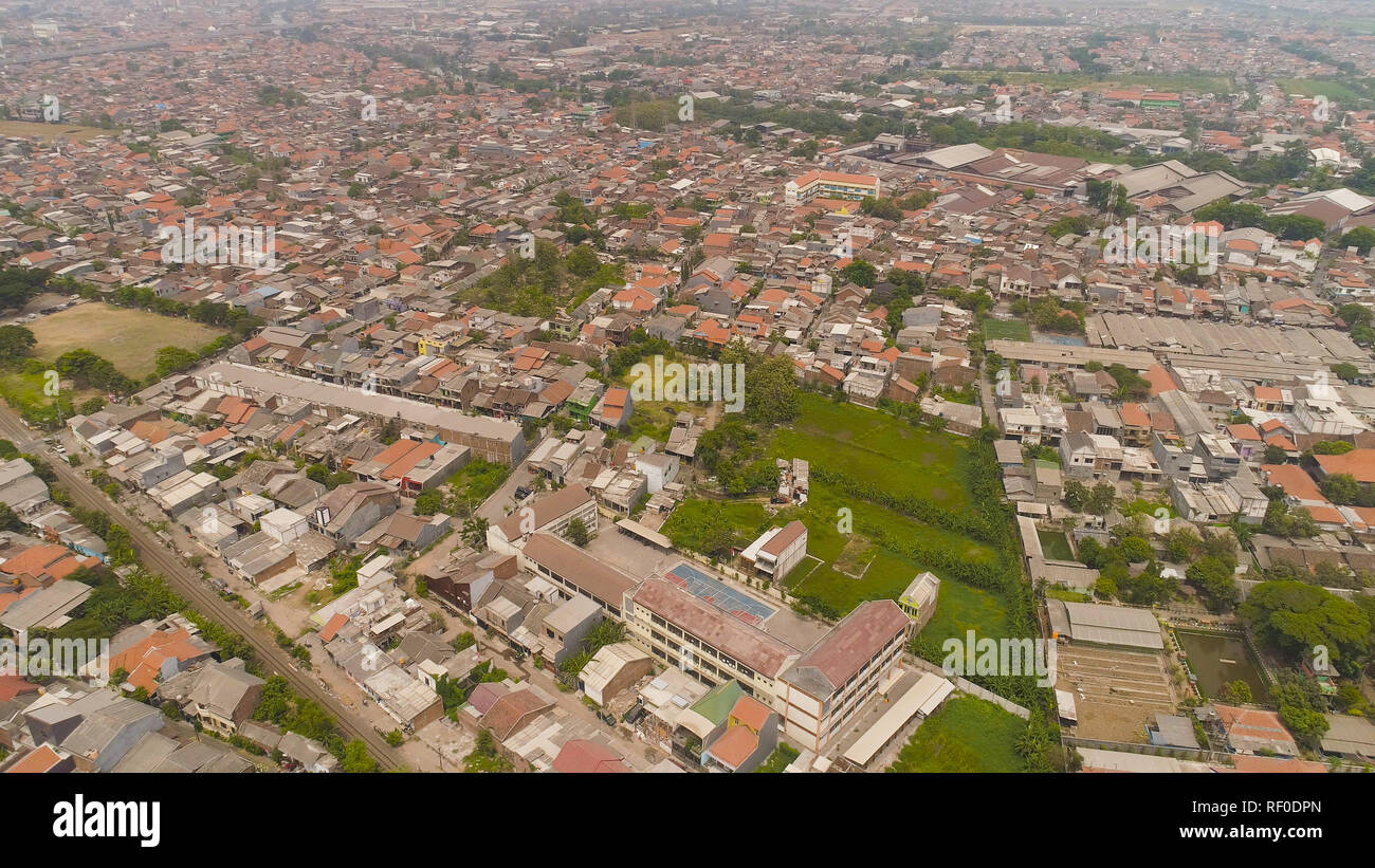 Aerial cityscape densely built asian city. modern city Surabaya with ...