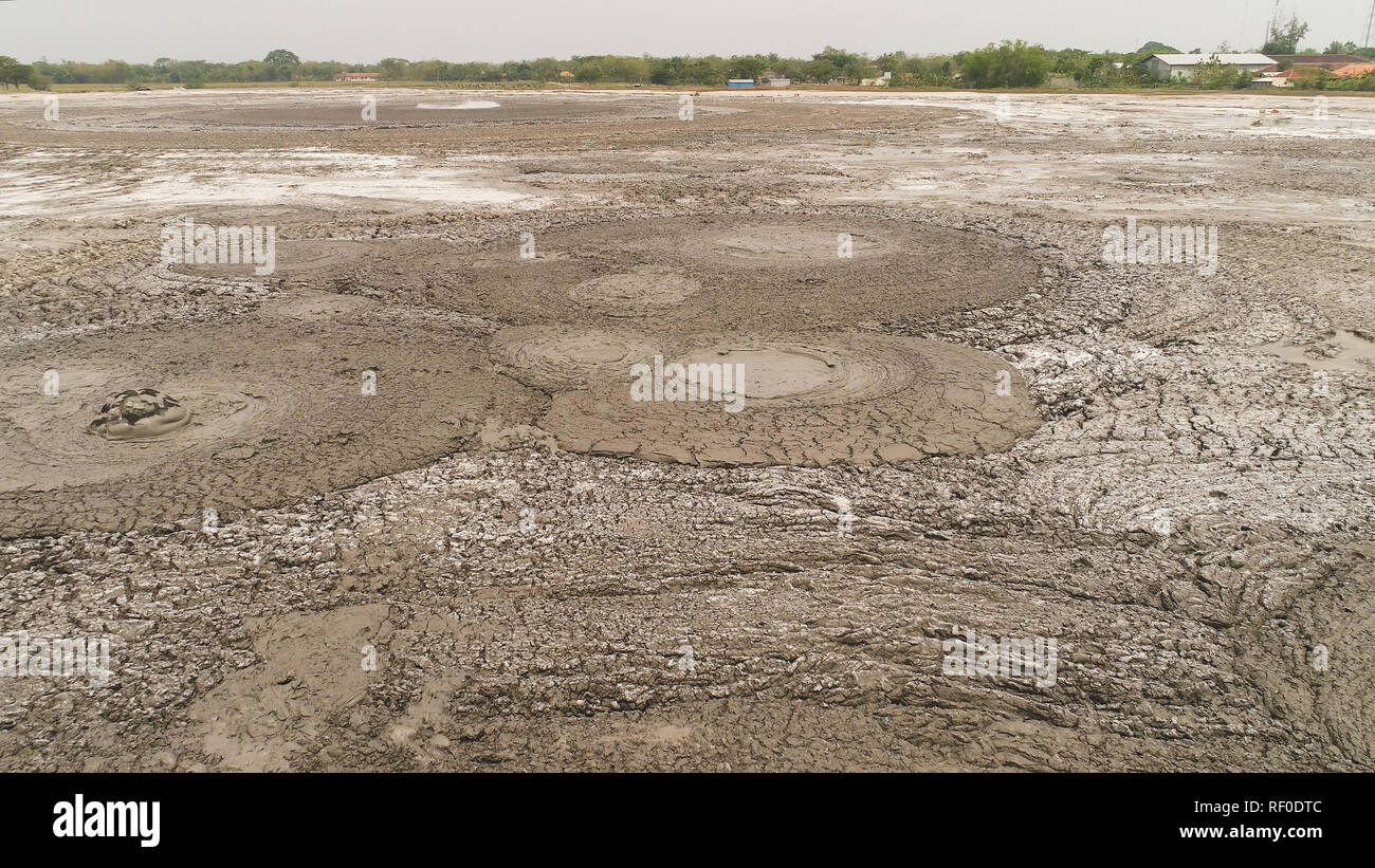 Mud volcano bledug kuwu. aerial view volcanic plateau with geothermal ...