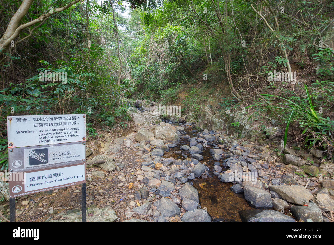 Warning signs to inform hikers at Shing Mun Country Park at Lo Wai ...