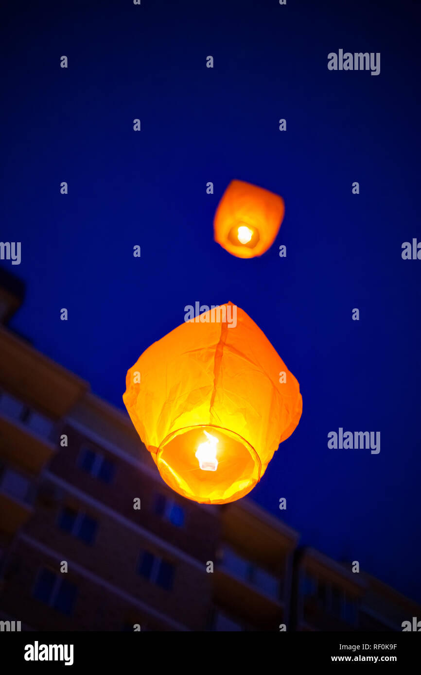 The Chinese lanterns fly up highly in the blue sky Stock Photo - Alamy