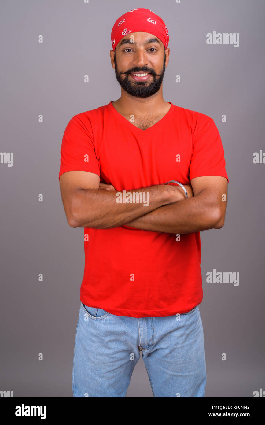Portrait of happy young Indian man smiling Stock Photo - Alamy