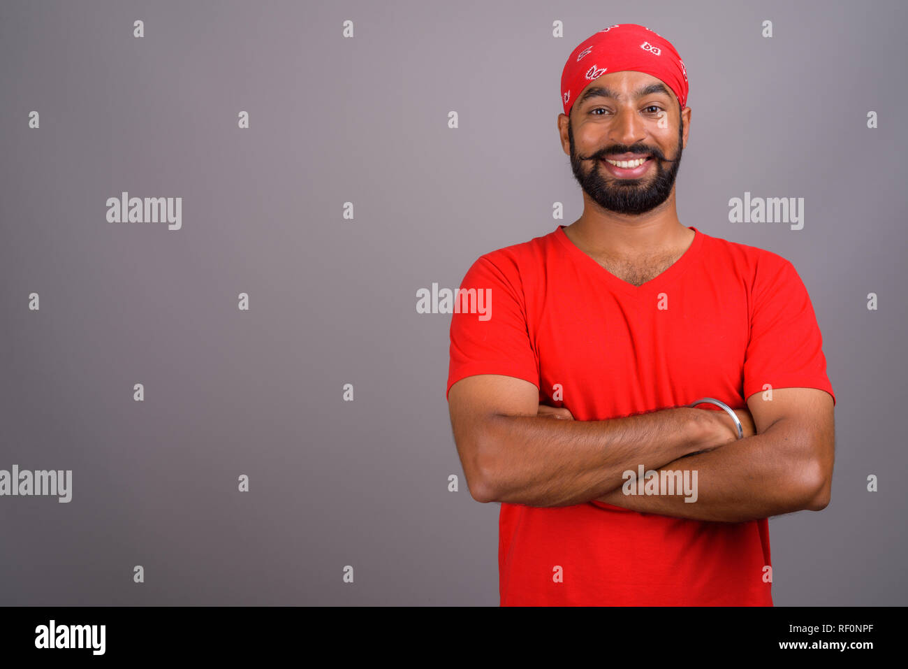 Portrait of happy young Indian man smiling Stock Photo - Alamy