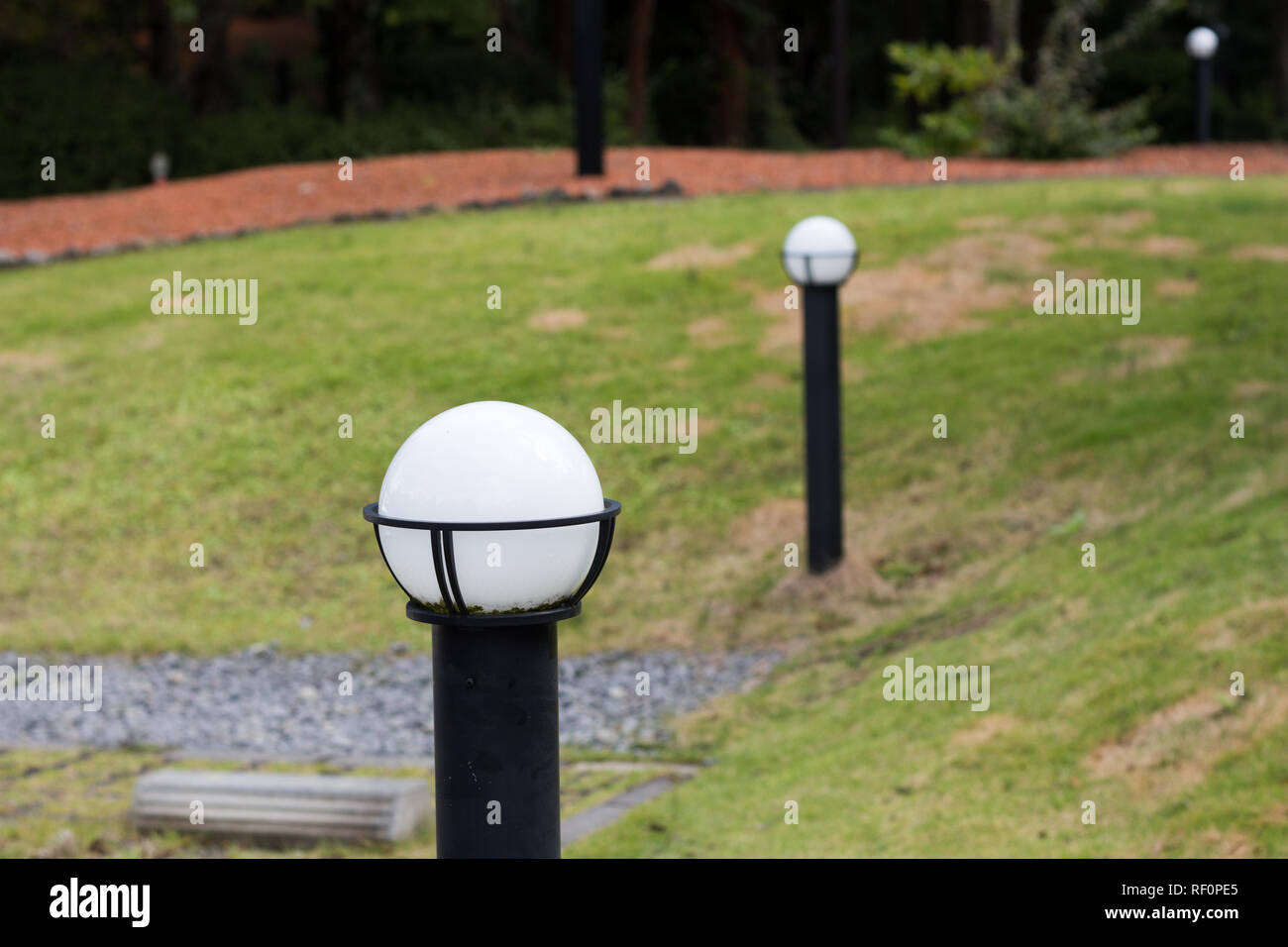 White round shaped garden lights in the daytime at garden Stock Photo ...