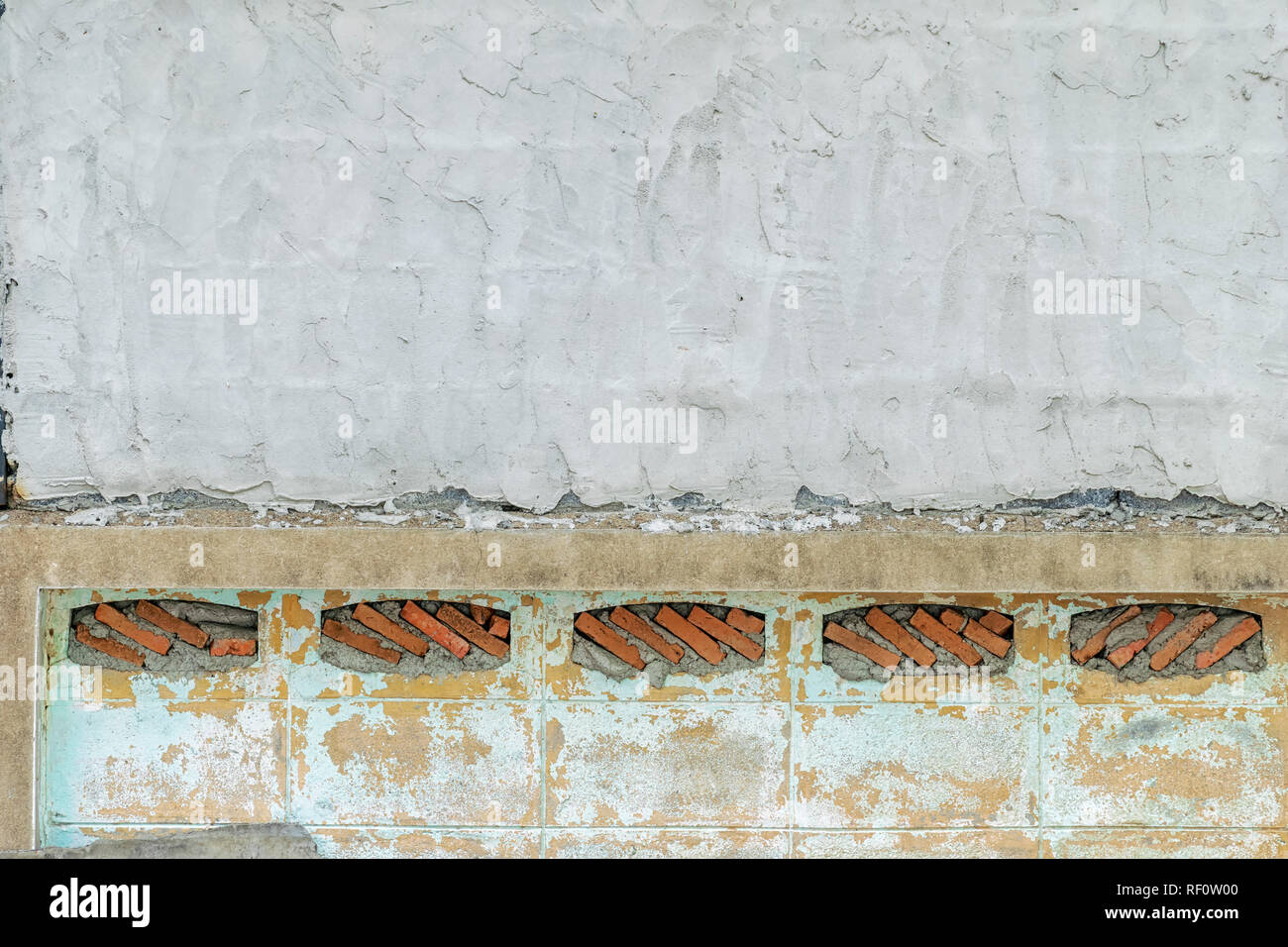The stone wall is stacked.The stones are arranged in a rectangular ...