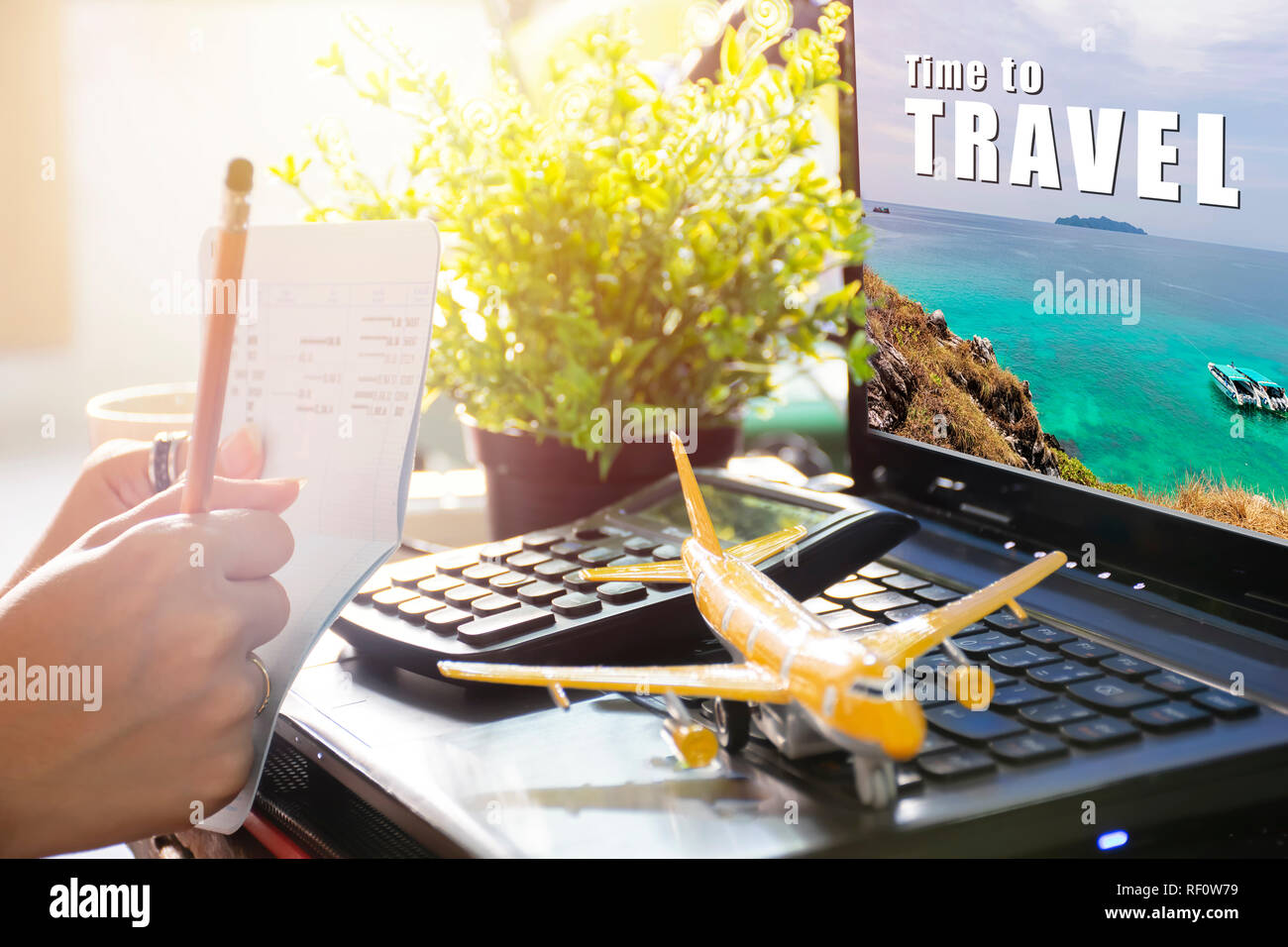 Planning a trip laptop map hi-res stock photography and images - Alamy