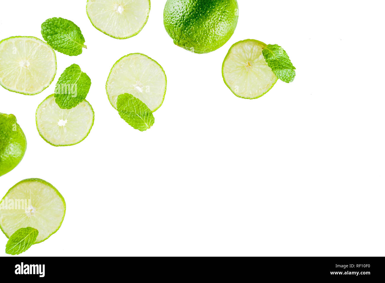 Fresh lime slice with mint leaves isolated on white background, top ...