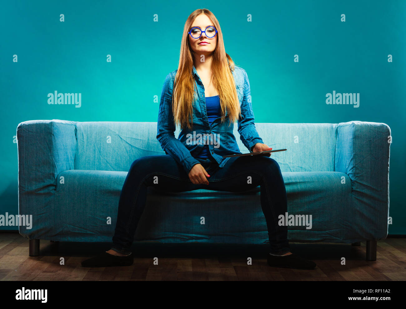 Fashion young woman in full length. Fashionable girl wearing denim ...