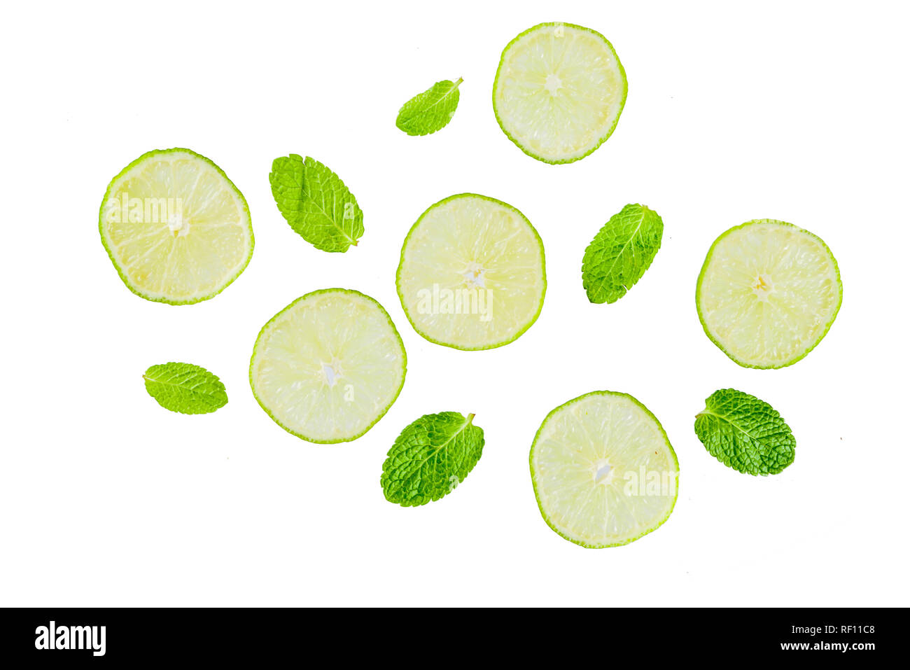 Fresh lime slice with mint leaves isolated on white background, top ...