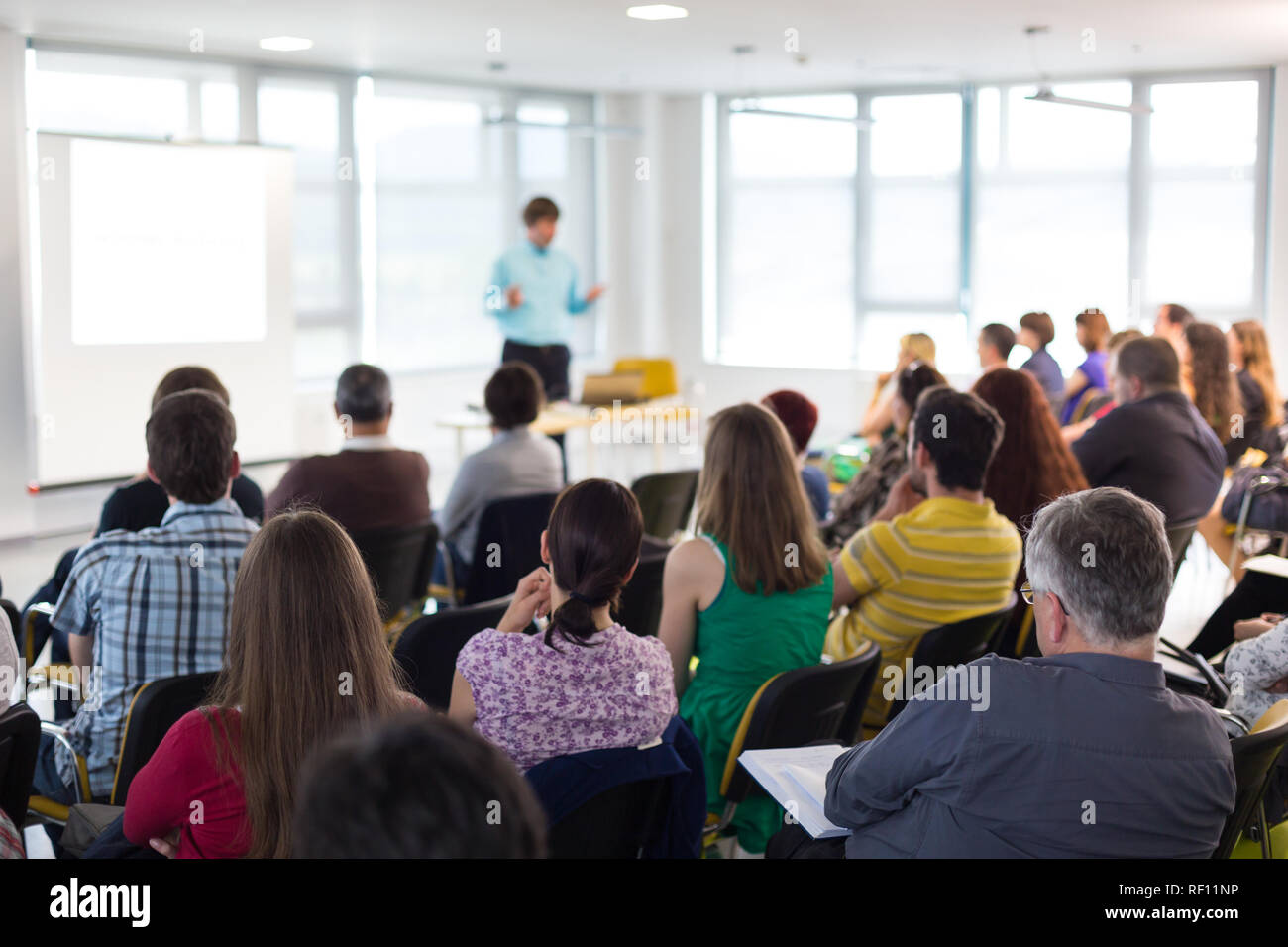 Speaker giving presentation on business conference Stock Photo - Alamy