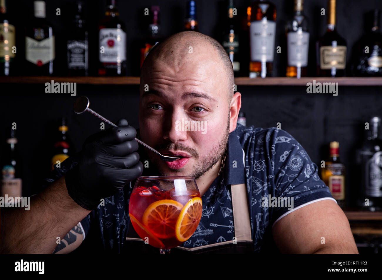Barman tasting of fresh and tasty Aperol syringe cocktail Stock Photo ...