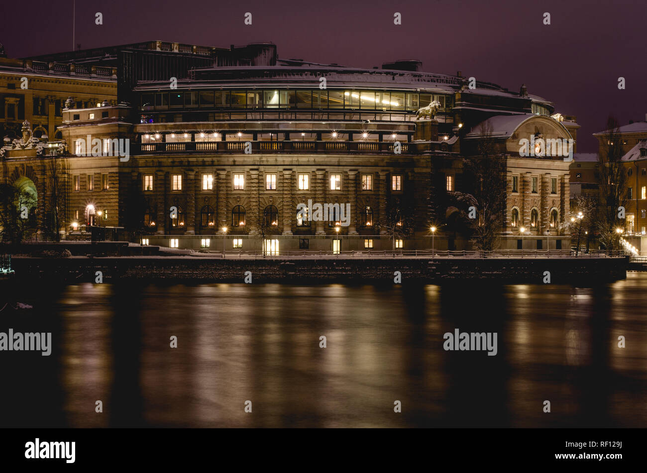 Riksdag (parliament) building at Helgeandsholmen island at night in Stockholm, Sweden Stock ...