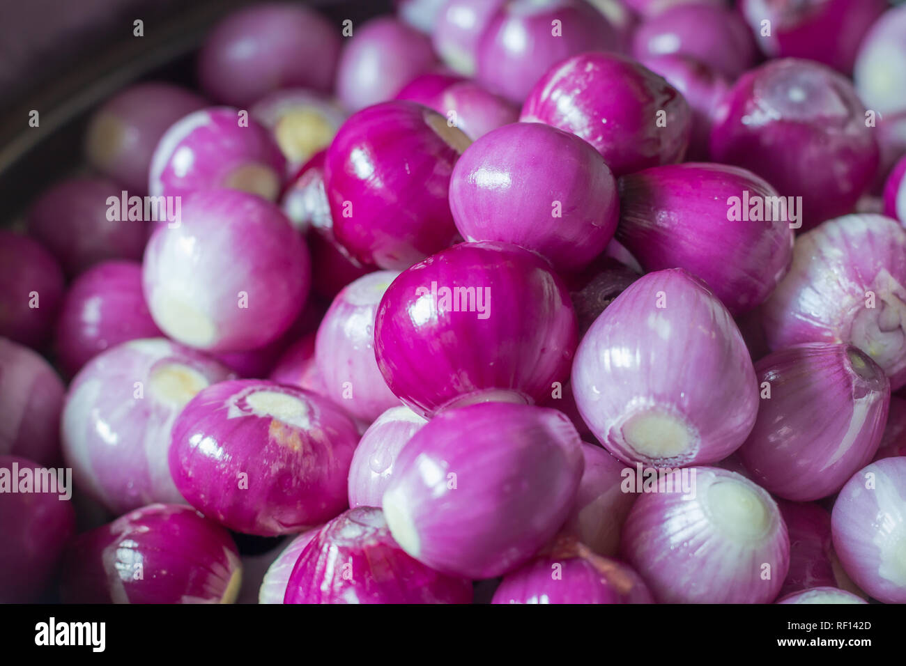 Shallots are a beautiful purple color is peeled and then have a pungent ...