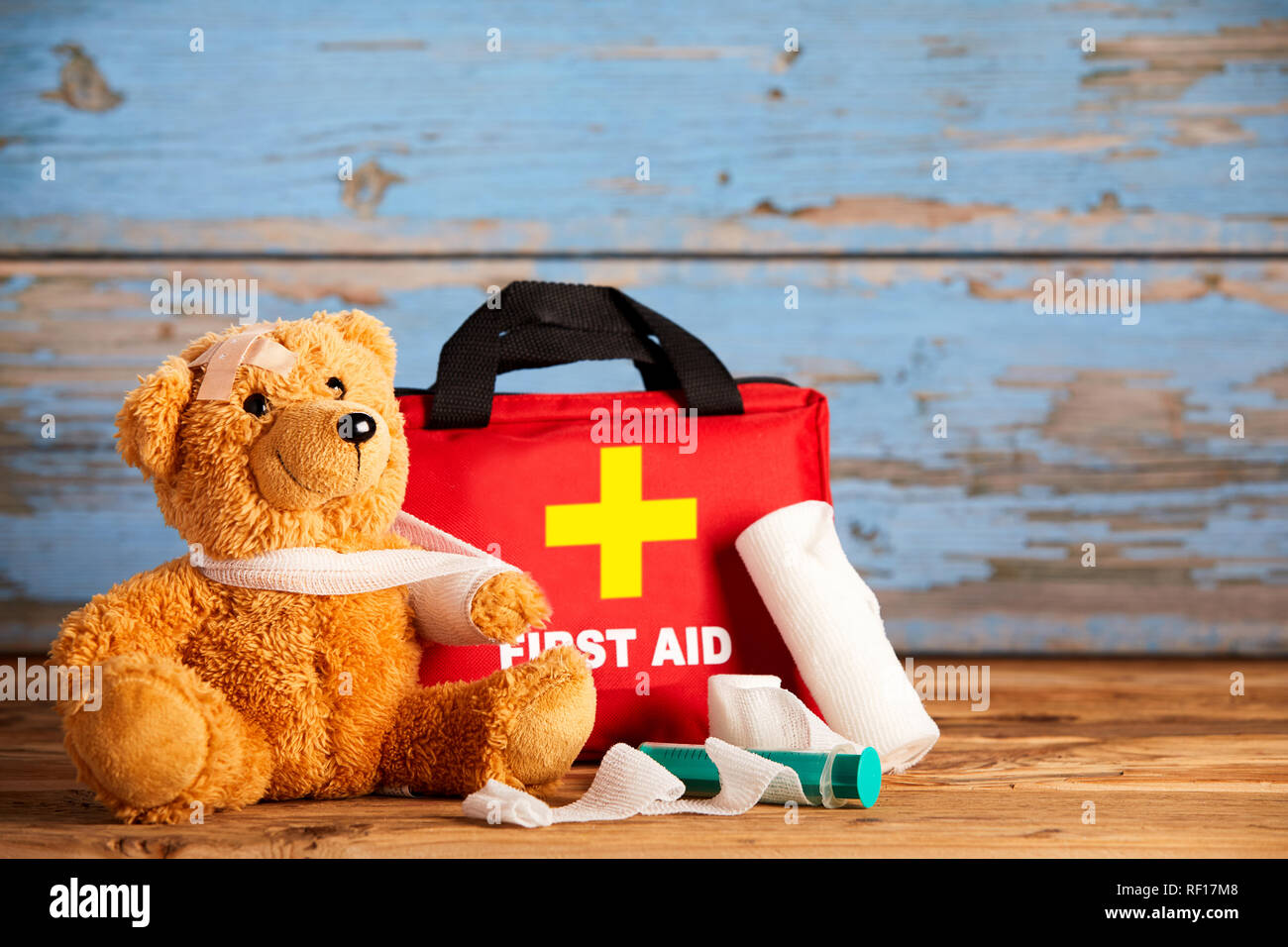 Paediatric healthcare concept with a little teddy bear with its arm in ...