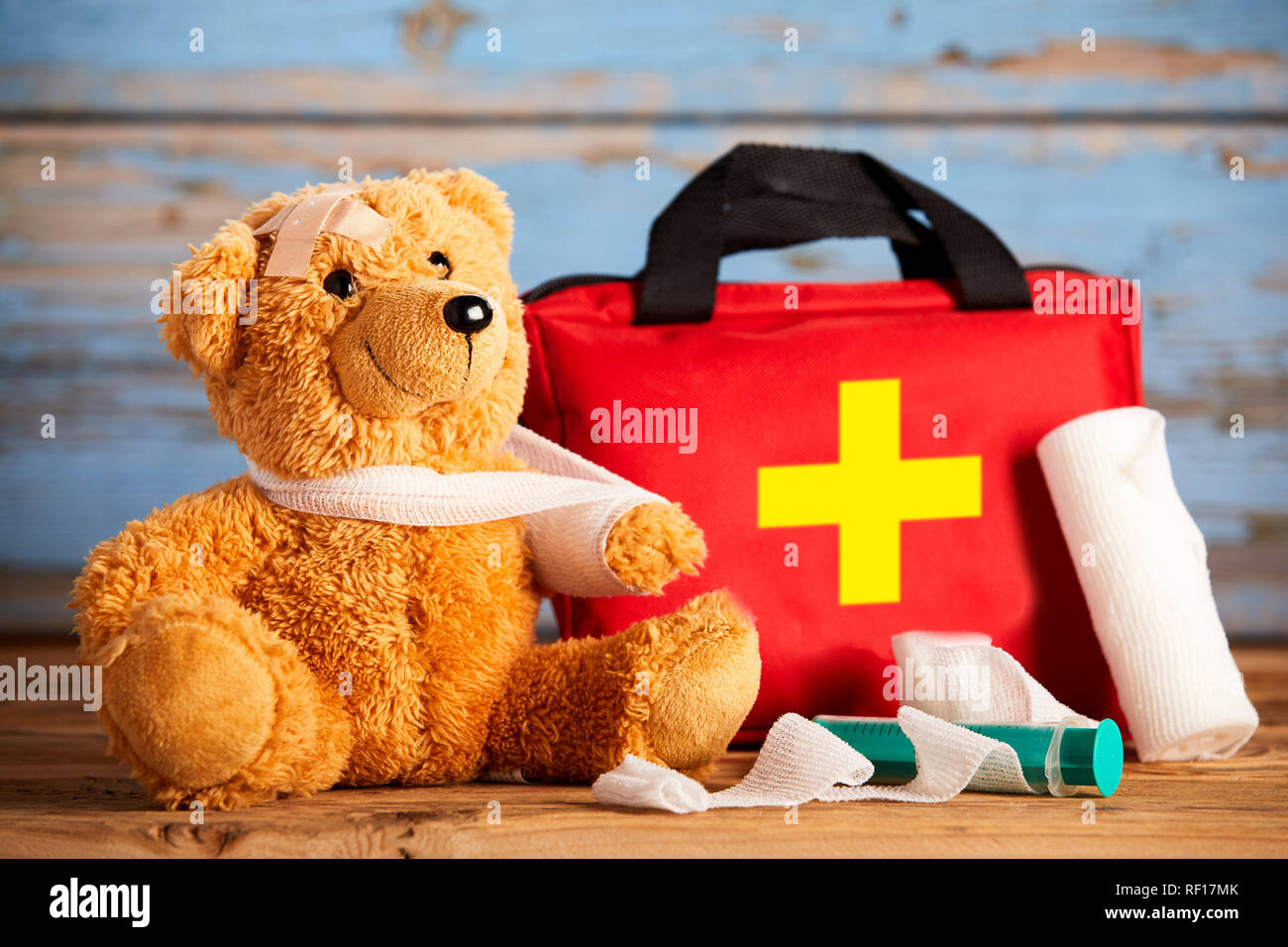 Paediatric healthcare concept with a little teddy bear with its arm in ...