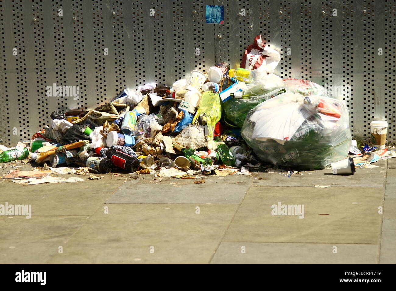 Pollution. General rubbish dumped on the concrete bed of a part of the ...