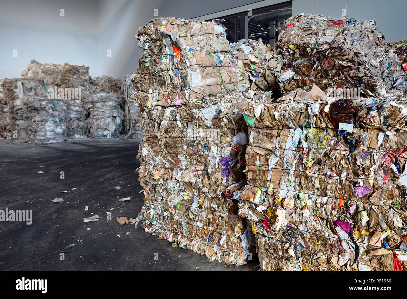 Old cardboard polyethylene and plastic pressed into bales at finished ...