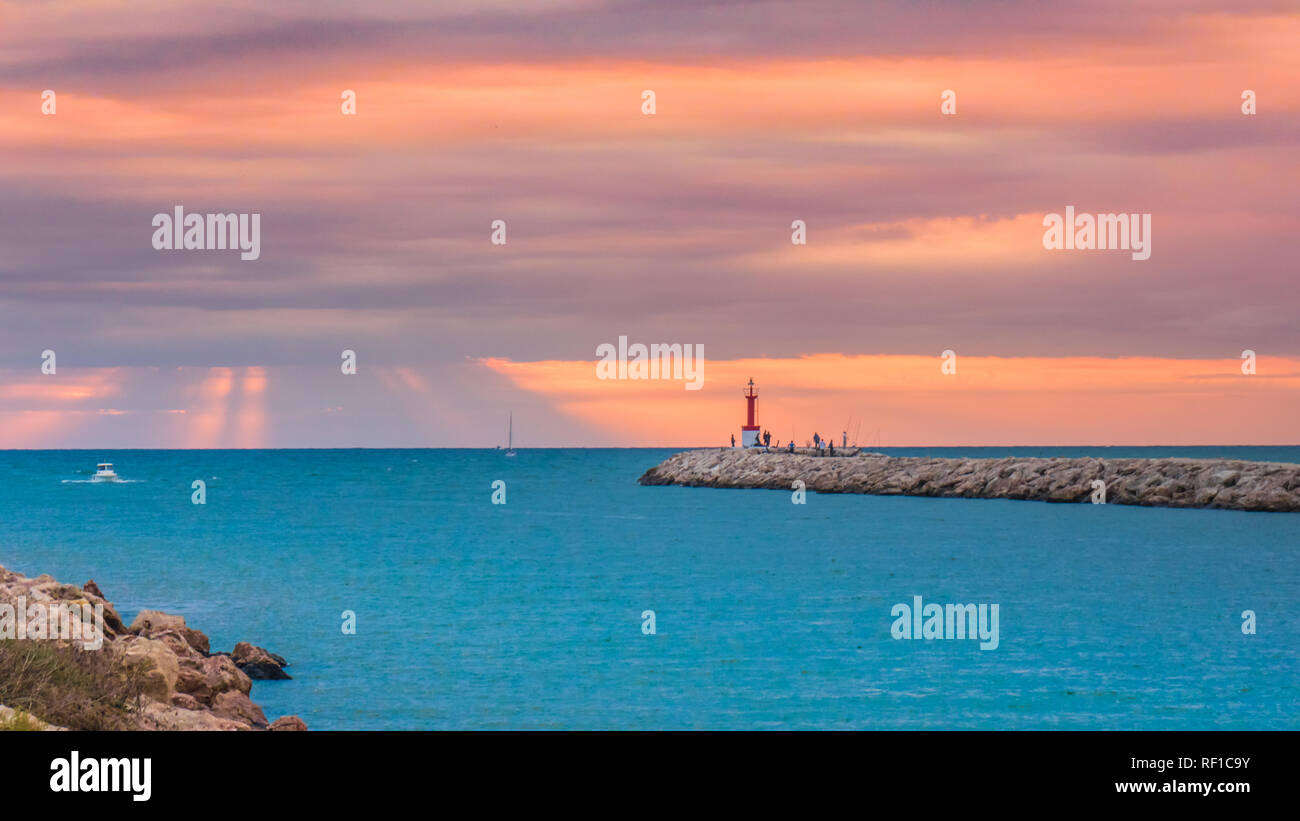 Sunrise between water breaks on the Jucar river in Cullera, Valencia ...