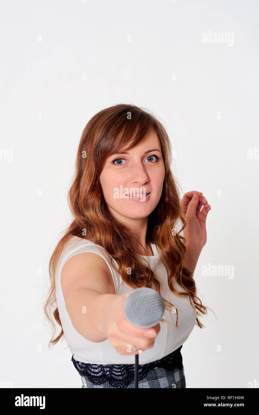 girl singing on a white background in the Studio Stock Photo - Alamy