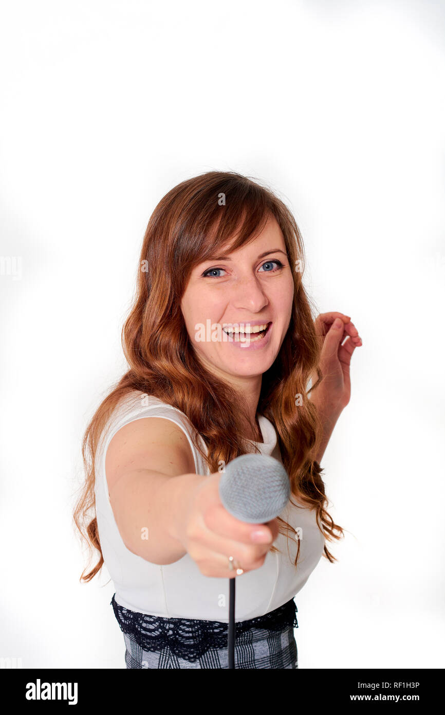 girl singing on a white background in the Studio Stock Photo - Alamy