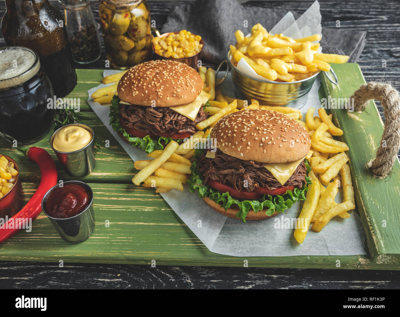 Burger pulled beef barbeque , sandwich, french fries, sauce, dark beer ...