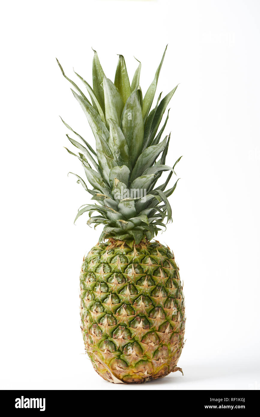 organic, sweet and tasty pineapple on white background Stock Photo - Alamy