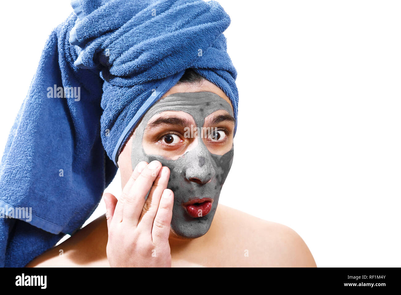 funny young man in mask for skin like woman rubbing skin gender ...