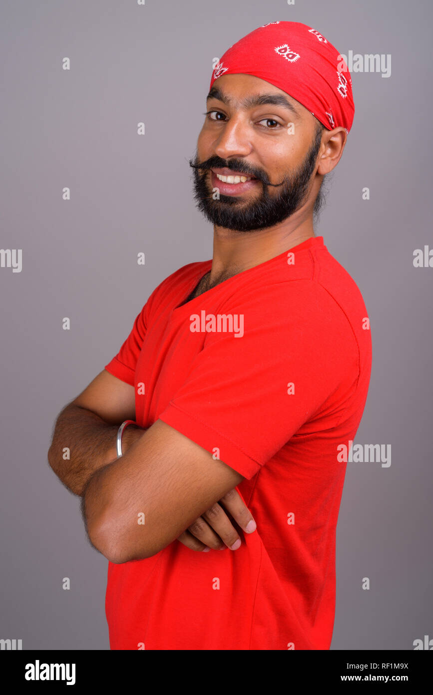 Young indian man smiling hi-res stock photography and images - Alamy