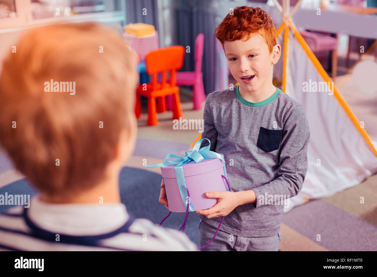 Kind little boy having birthday party at home Stock Photo - Alamy