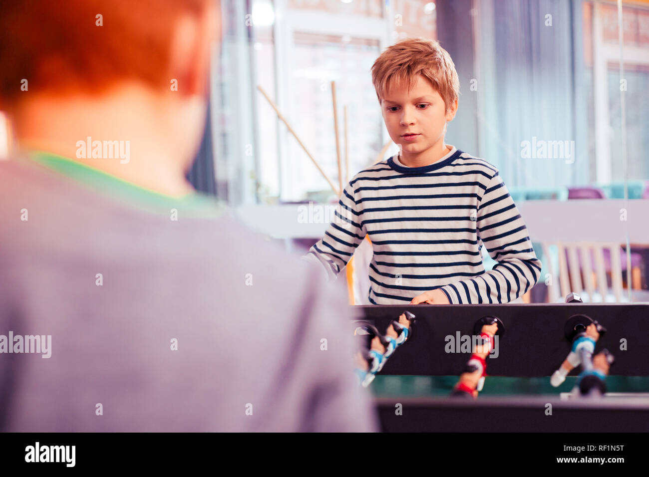Two friends playing football hi-res stock photography and images - Alamy