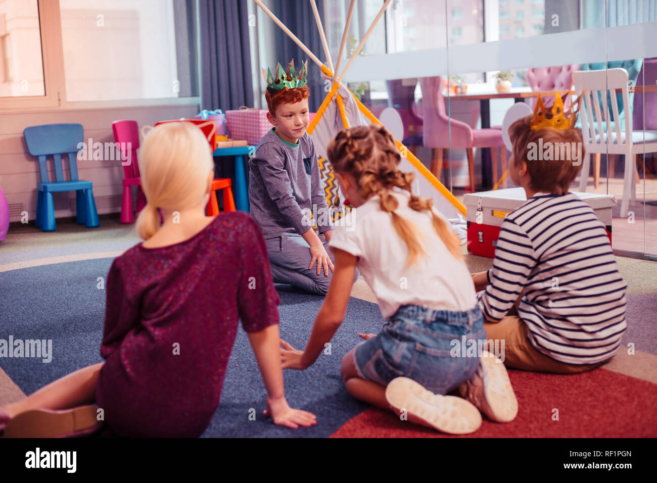 Group of kids turning on their imagination Stock Photo - Alamy