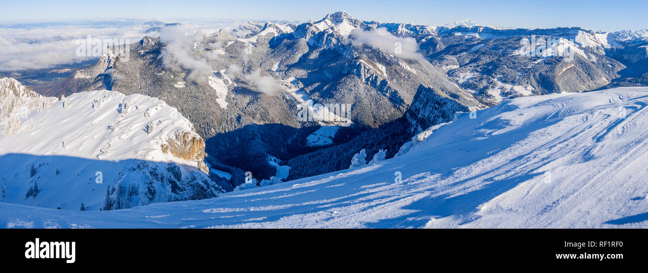 Panoramic view of the Chartreuse mountains covered in snow with the ...