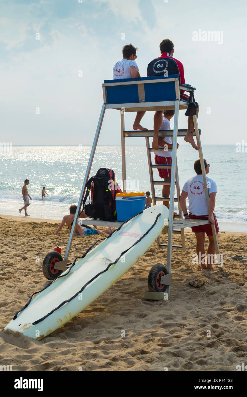 Beach and lifeguards Stock Photo - Alamy