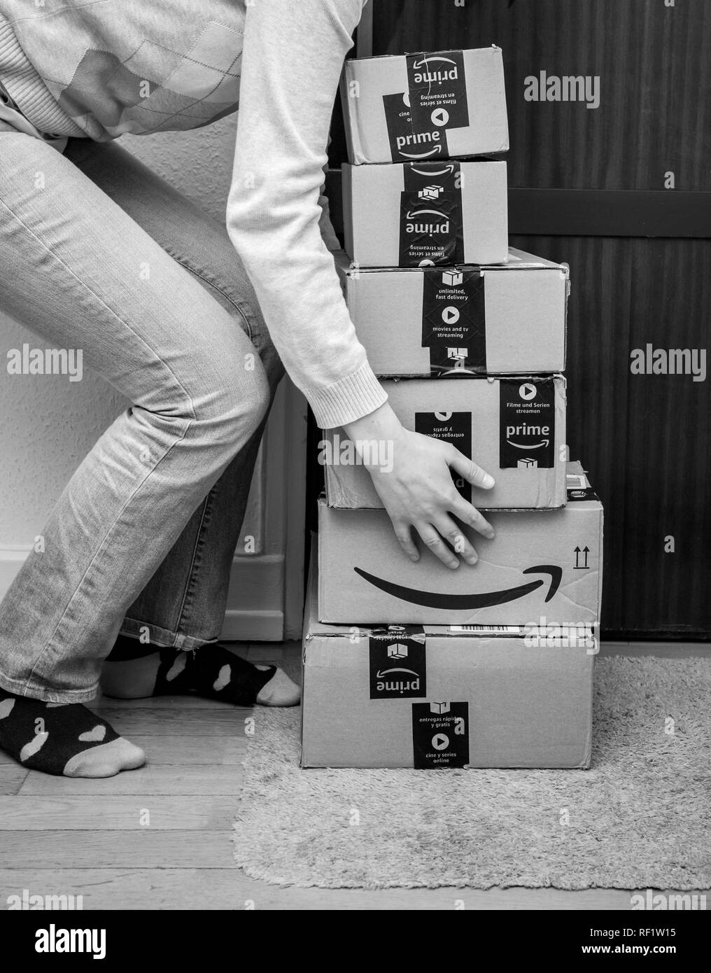 PARIS, FRANCE - JAN 13, 2018: Stack of Amazon Prime packages delivered ...