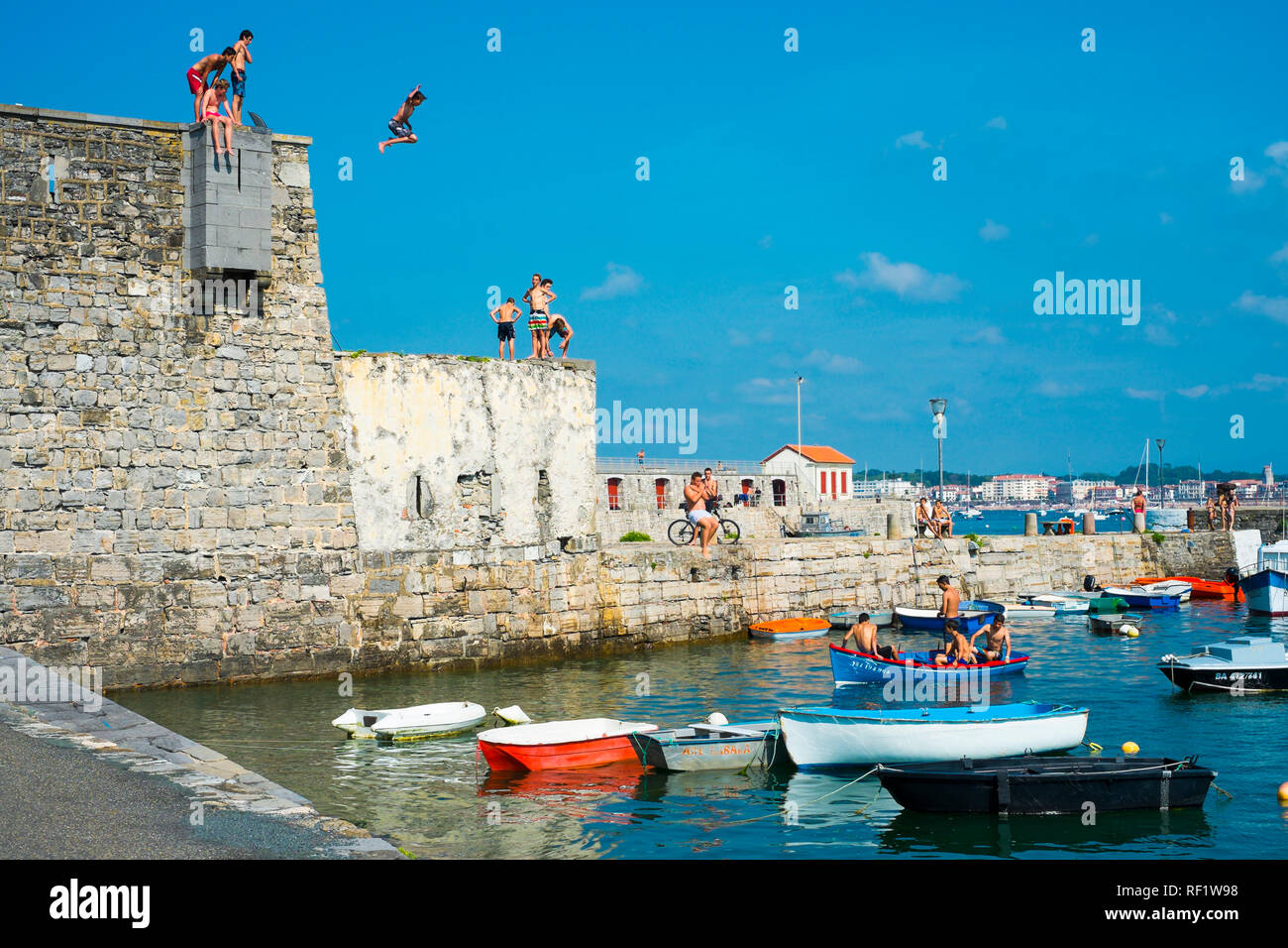 Jumping in the harbour hi-res stock photography and images - Alamy