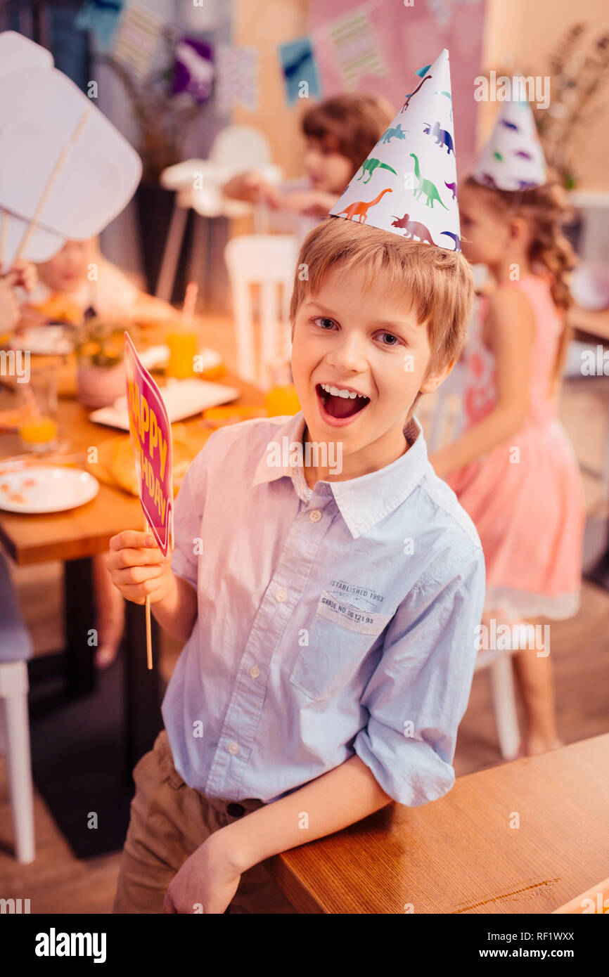 Positive delighted blonde boy looking forward at you Stock Photo - Alamy
