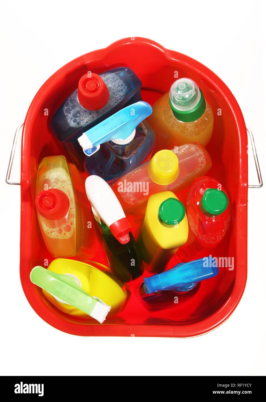 Assorted household cleaners in plastic bottles, cleaning products in a ...