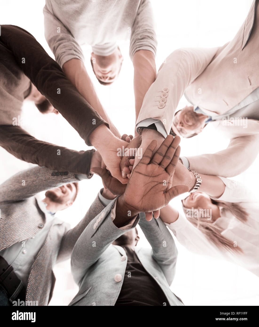 business background.business team making a stack of hands Stock Photo ...