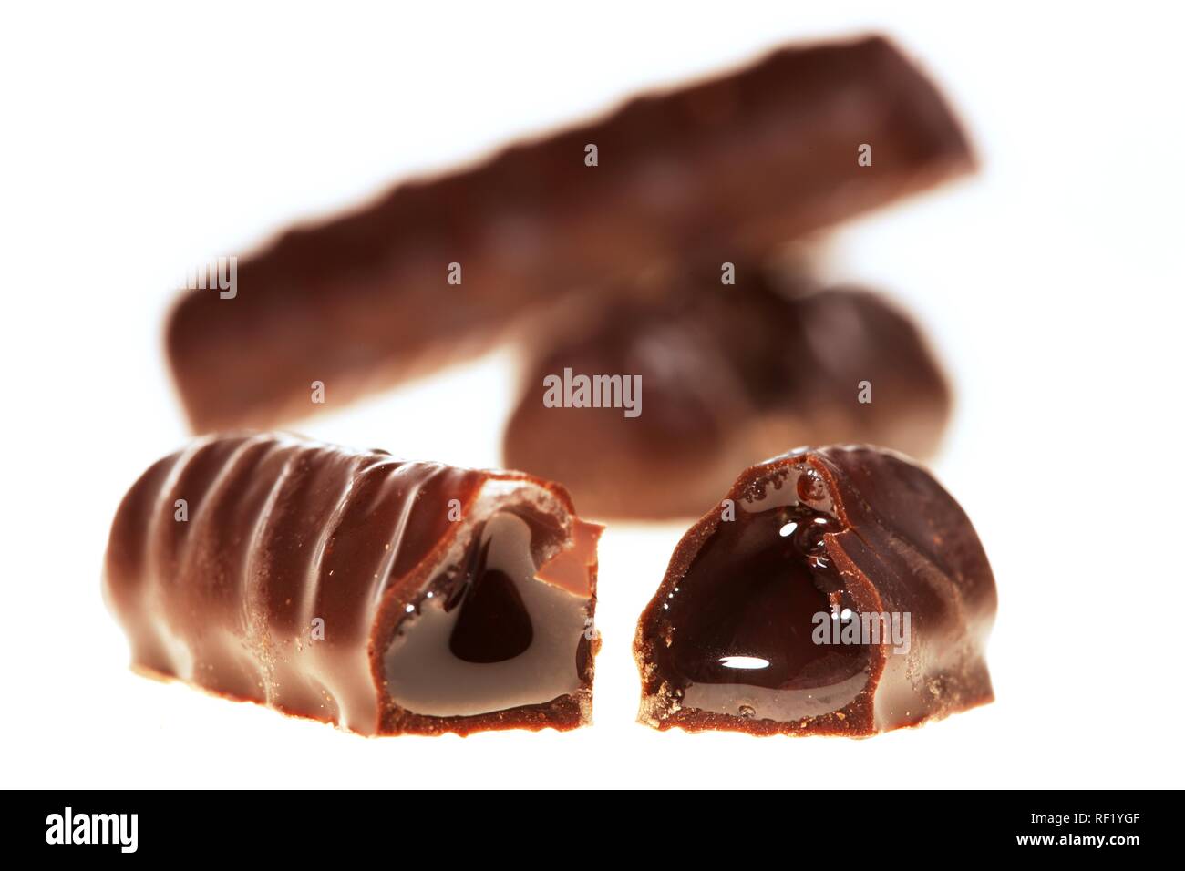 Sweets, chocolate pralines filled with flavoured syrup Stock Photo - Alamy