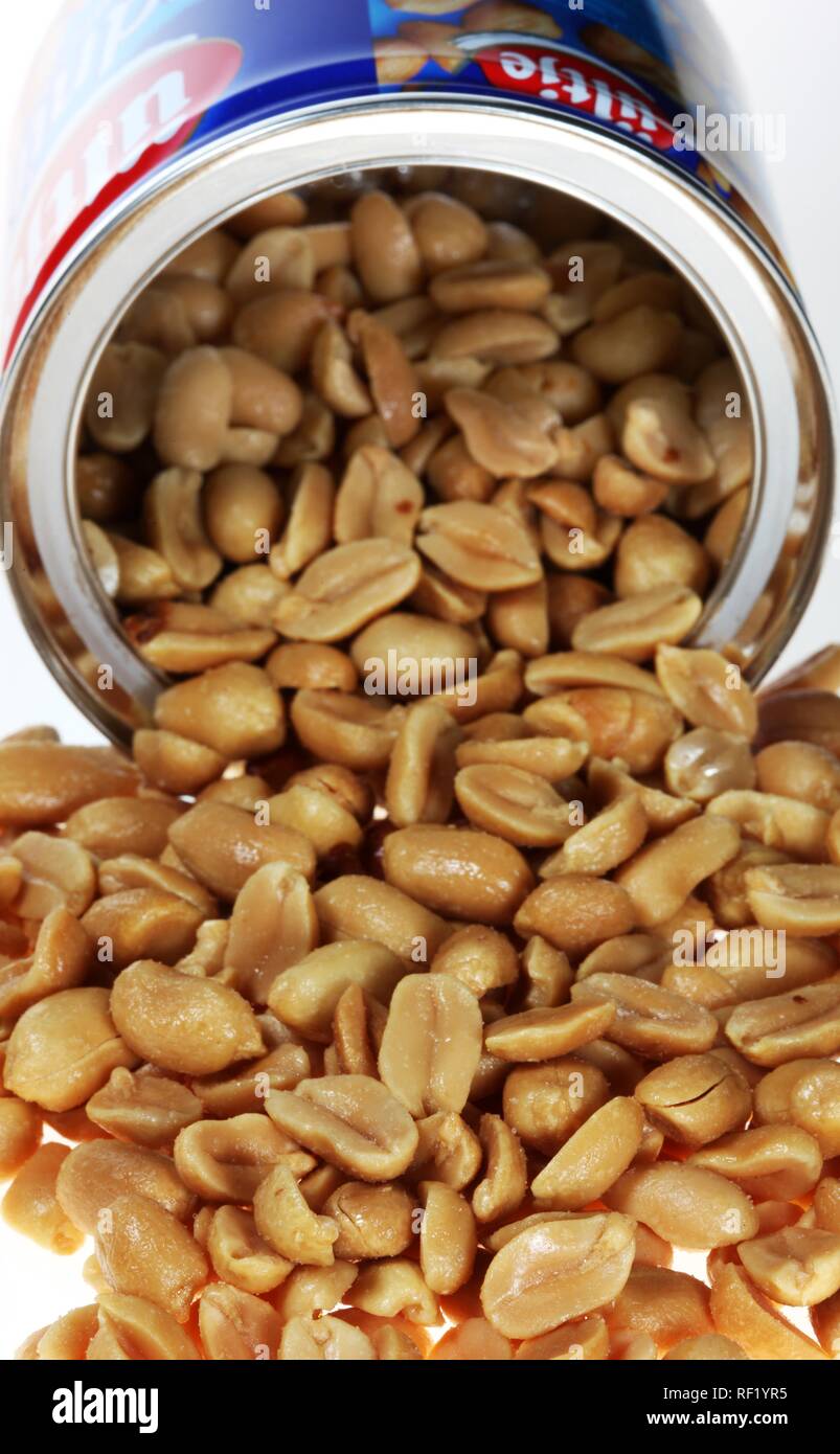 Salted peanuts, tin Stock Photo - Alamy