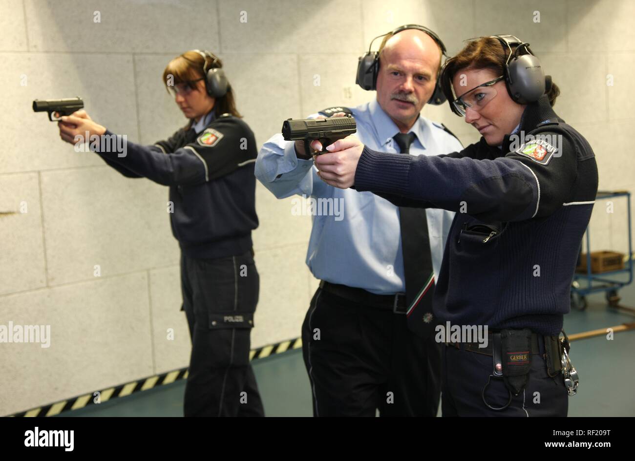 Woman pistol exercise hi-res stock photography and images - Alamy
