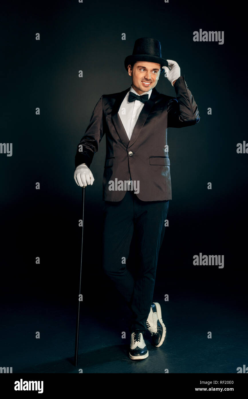 Professional Occupation. Showman in suit gloves and hat standing ...