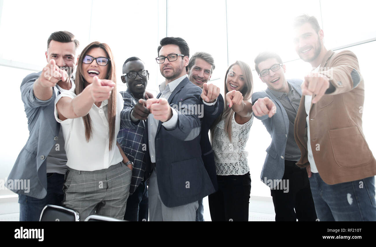 group of young employees pointing at you Stock Photo - Alamy
