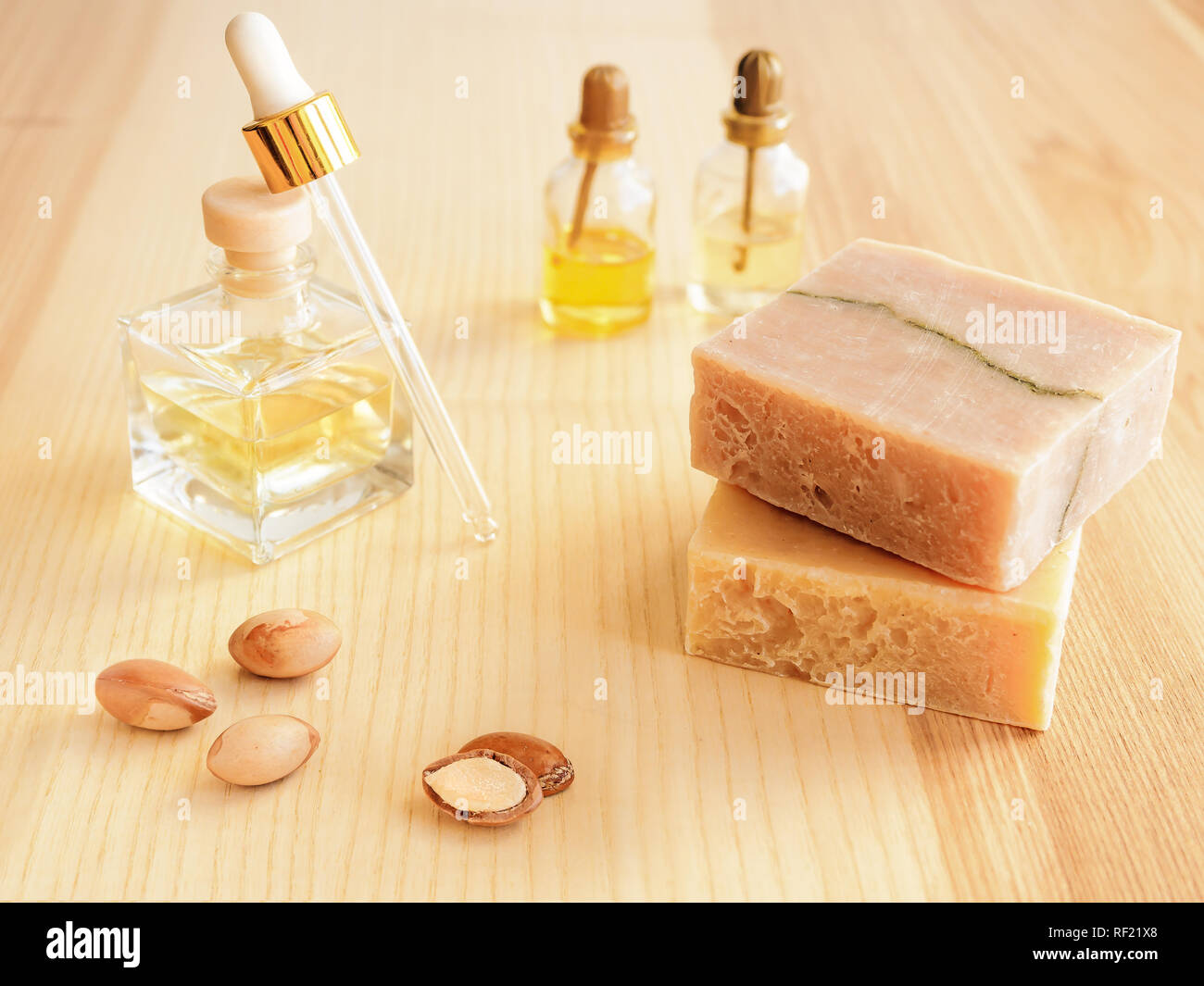 Bottles with cosmetic oil argan nuts. Cosmetic means. Food product. Jar ...