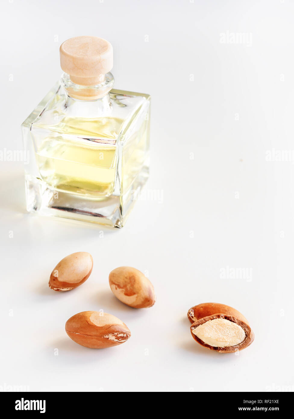 Bottle with valuable oil argan nuts. Cosmetic means. Food product. Jar ...