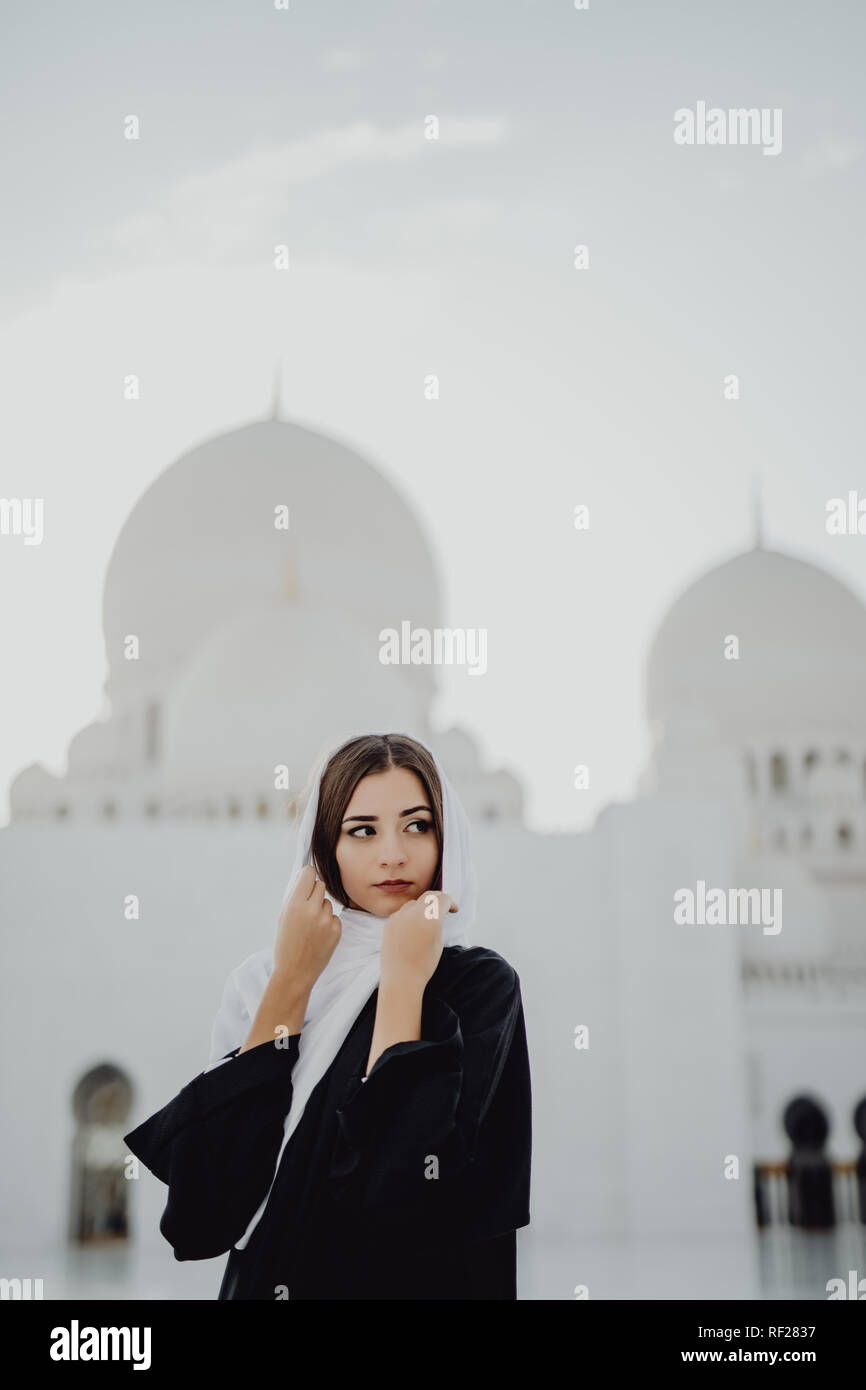 Beautiful woman in Arabic clothes at Sheikh Zayed Grand Mosque in Abu ...