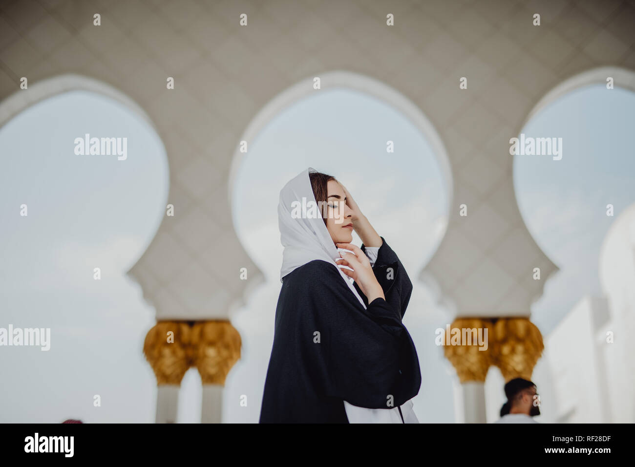 Beautiful woman in Arabic clothes at Sheikh Zayed Grand Mosque in Abu ...